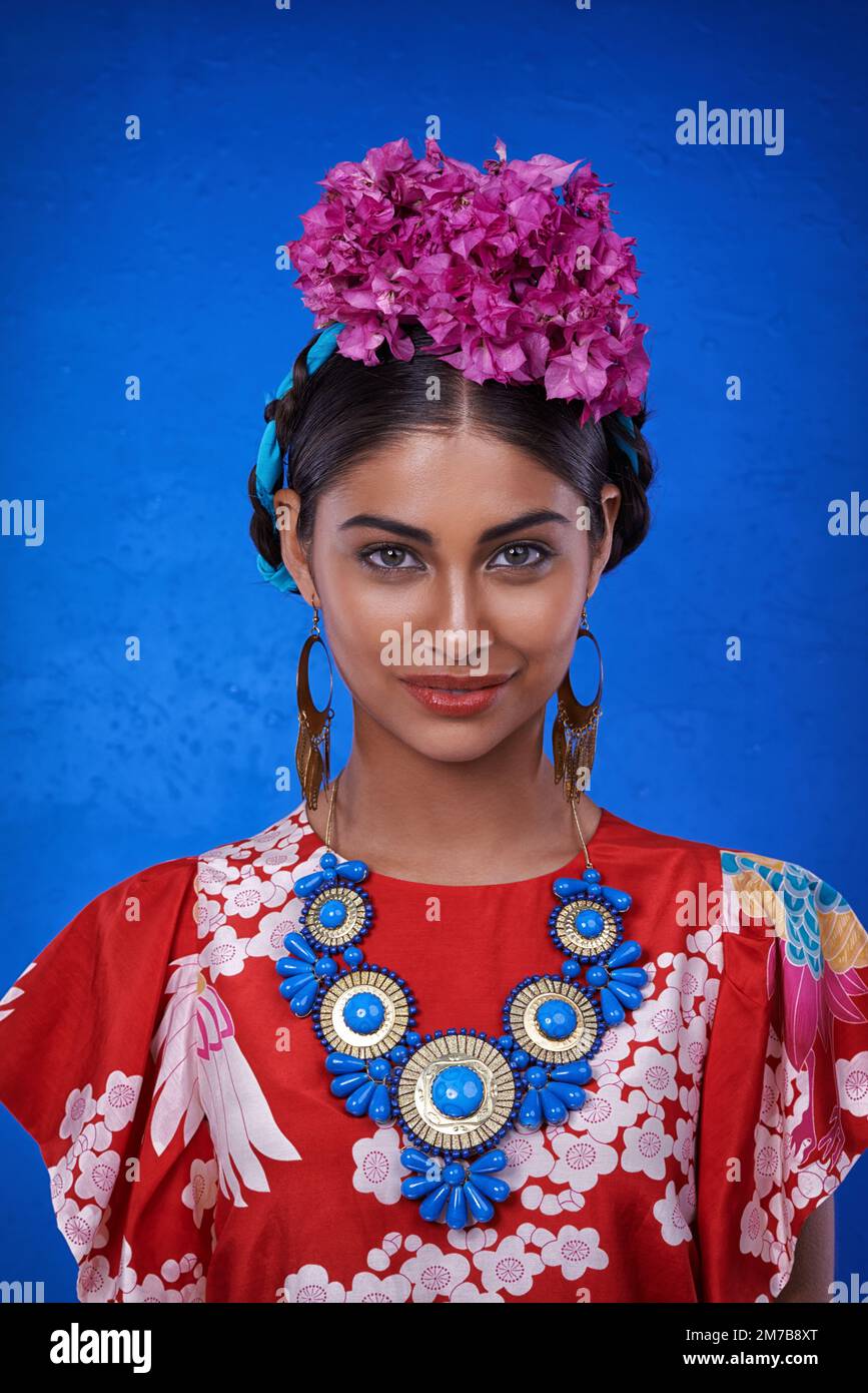 Beauty and culture. A beautiful young woman wearing traditional ...