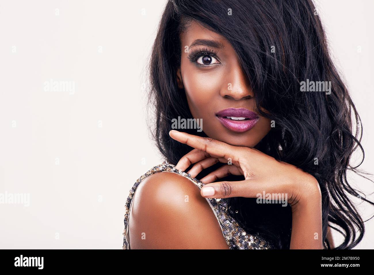Eye-catching beauty. Portrait of a beautiful young woman posing in ...