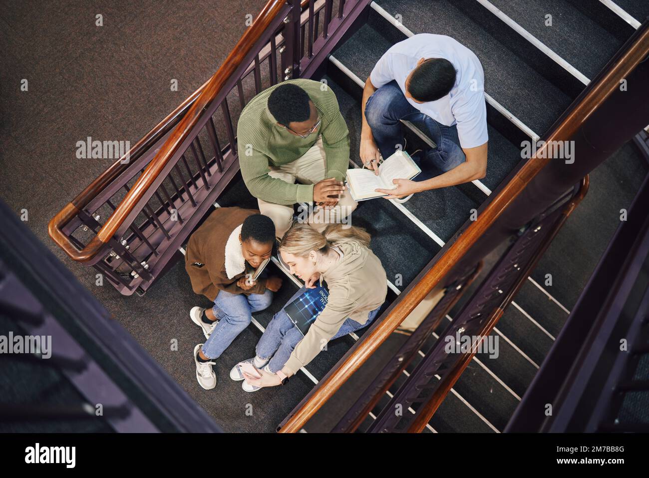 Above, student group and stairs for reading together, studying and ...