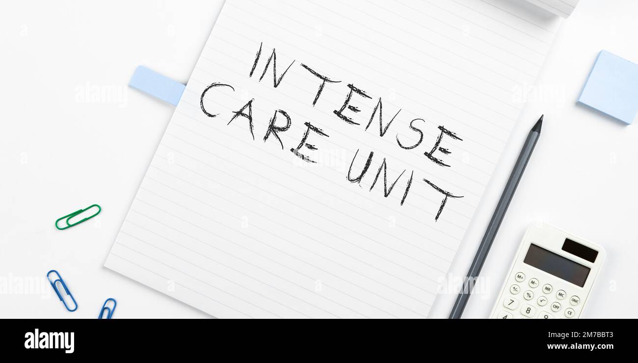 Hand writing sign Intense Care Unit. Business concept a unit in a ...