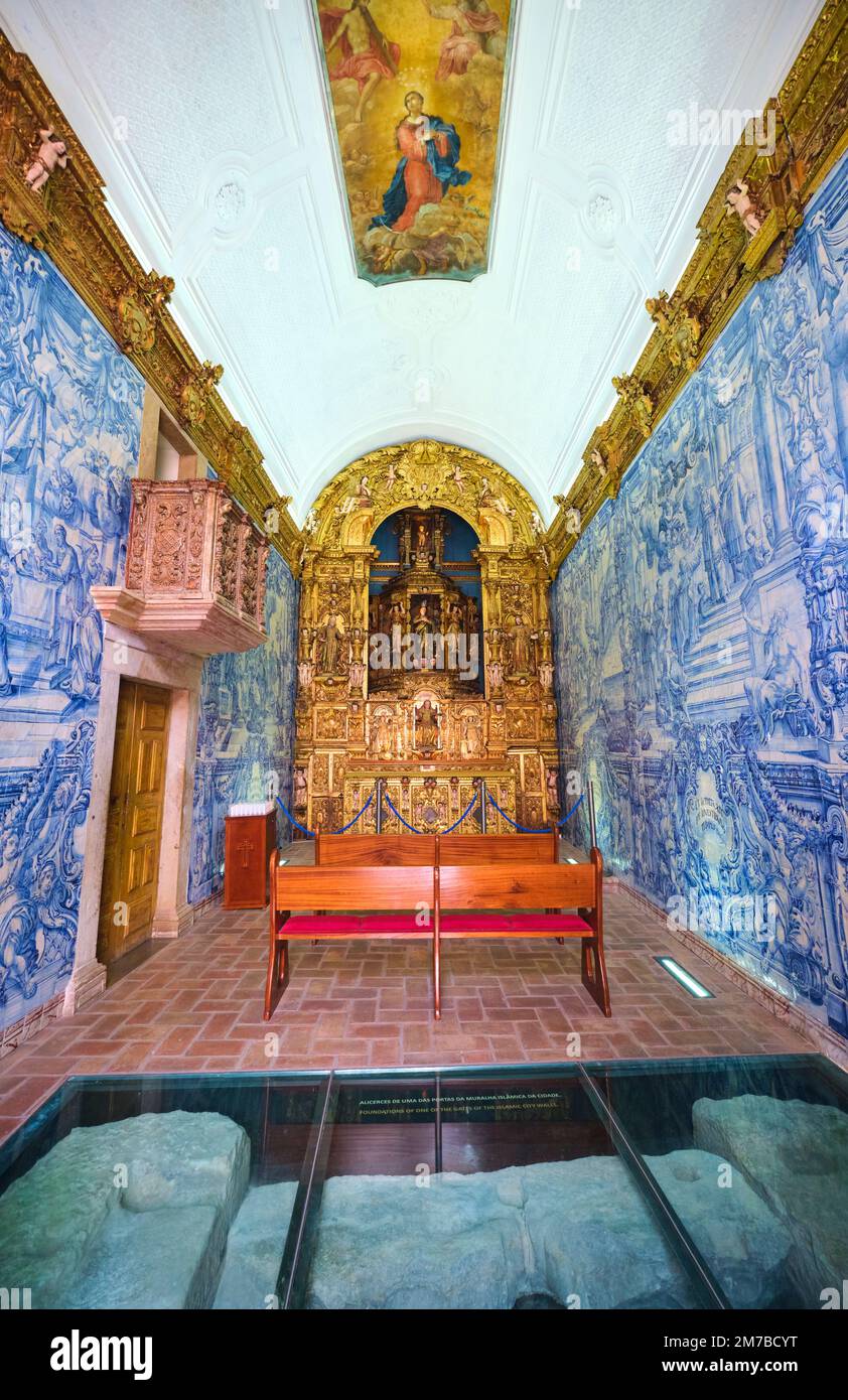 Interior view of the small chapel, with richly carved, gold, wood altar ...