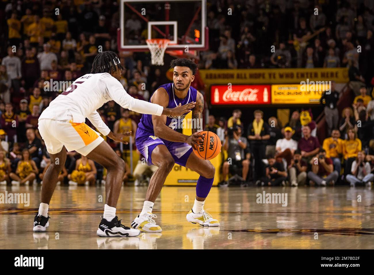 University of Washington guard Jamal Bey (5) looks down court in the ...