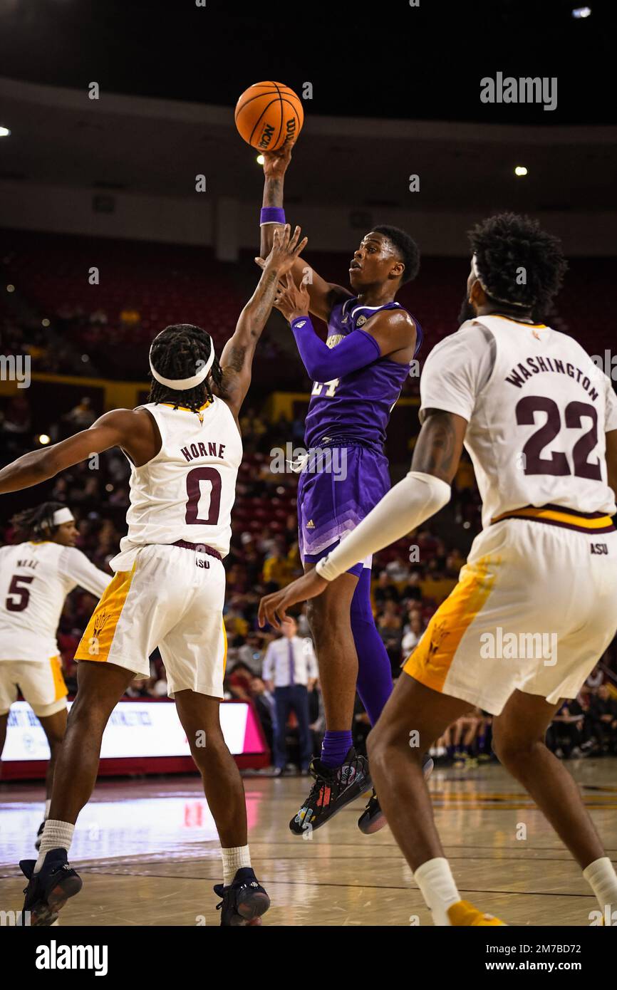 University of Washington guard Noah Williams (24) attempts a shot in ...