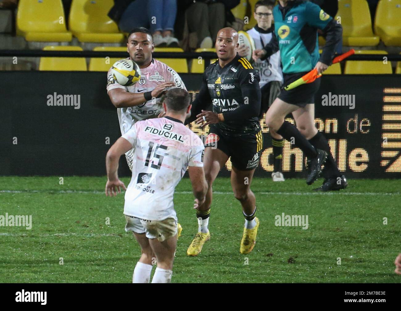 Teddy Thomas of Stade Rochellais and Peato Mauvaka of Stade Toulousain ...