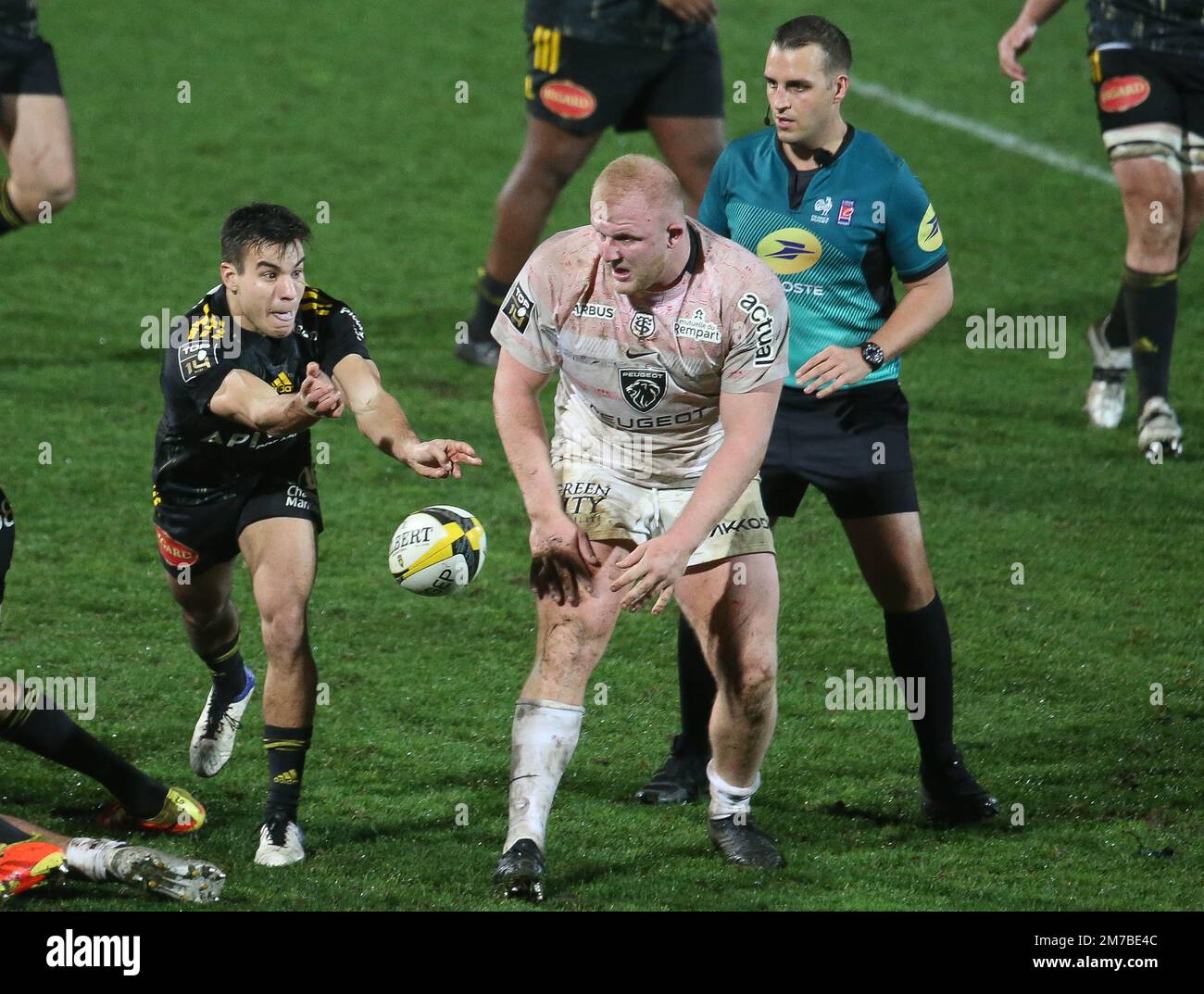 Thomas Berjon of Stade Rochellais and Joel Merkler of Stade Toulousain ...