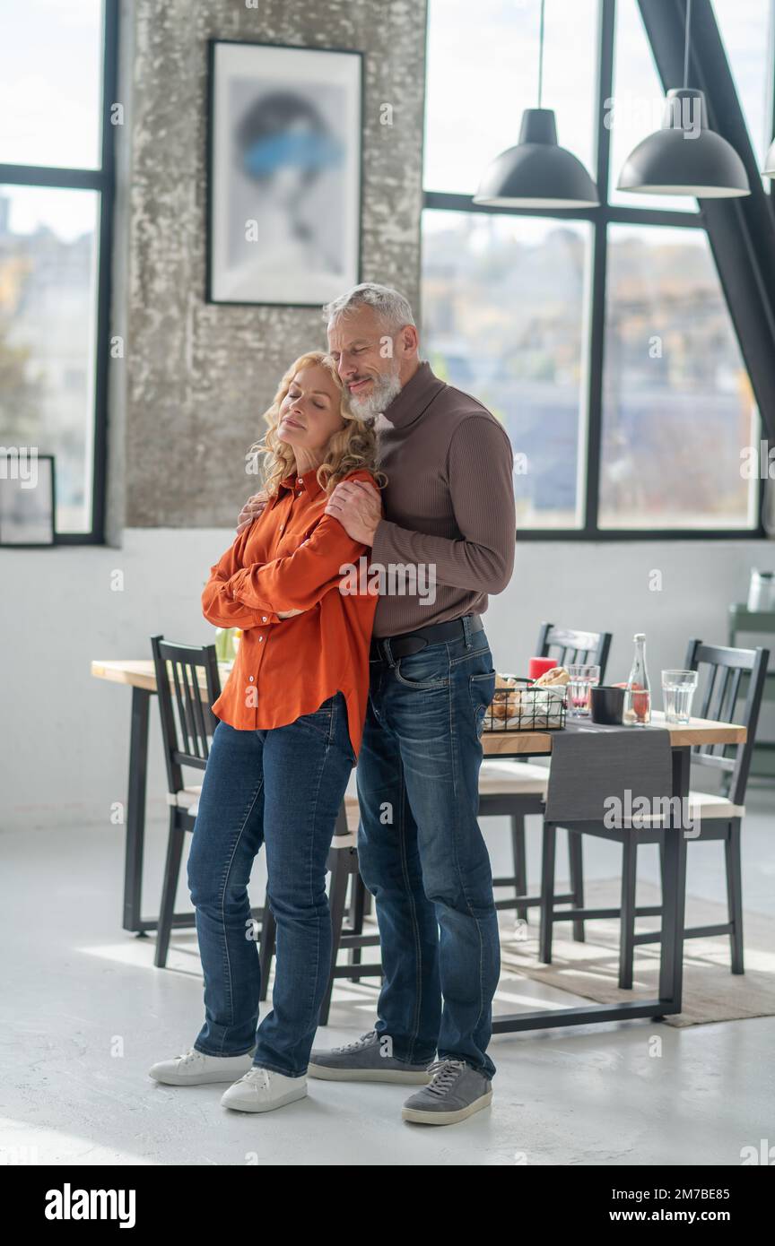 Mature couple looking peaceful and romantic Stock Photo - Alamy
