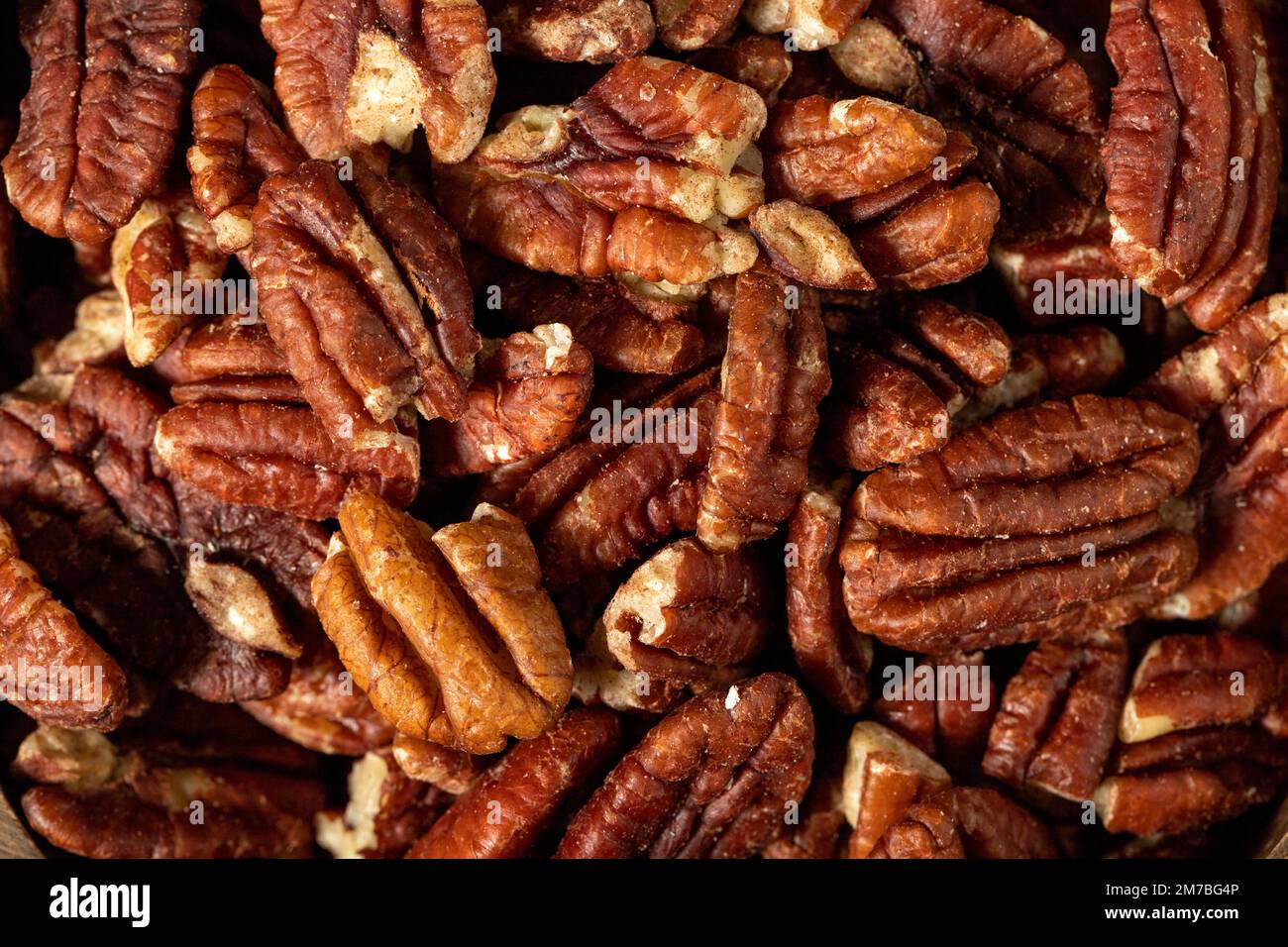 Pecan on dark background. Healthy fat. Heap shelled Pecans nut. Close ...