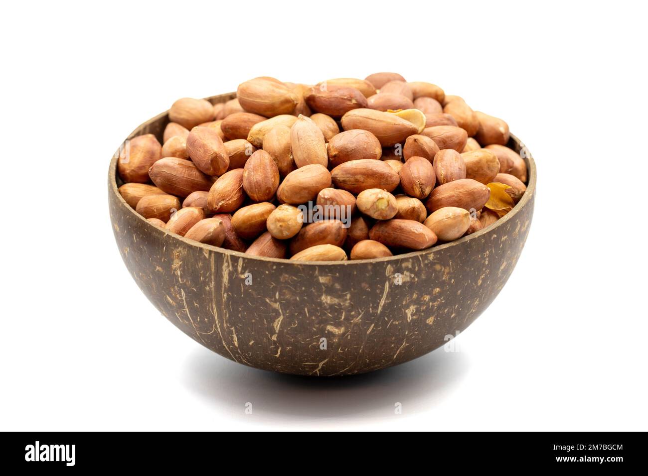 Peanuts isolated on white background. Peanuts in a coconut bowl. Studio ...