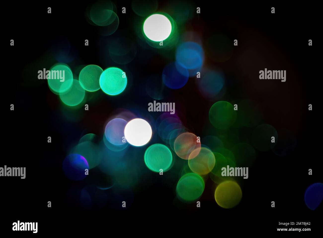 Abstract colorful defocused circular facula. Bokeh blurred color light ...