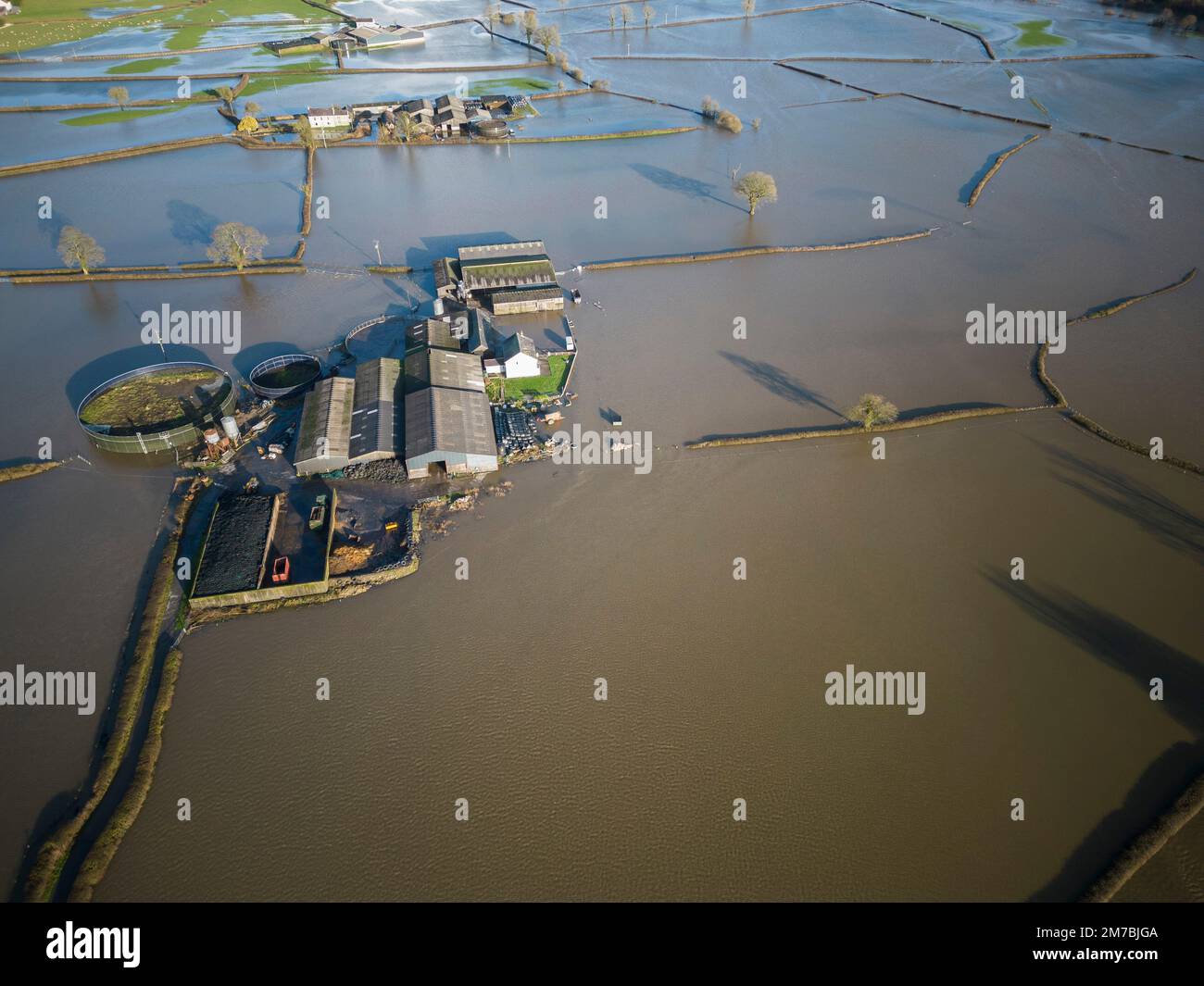 Drone images showing farms surrounded by flood water near Carmarthen in ...