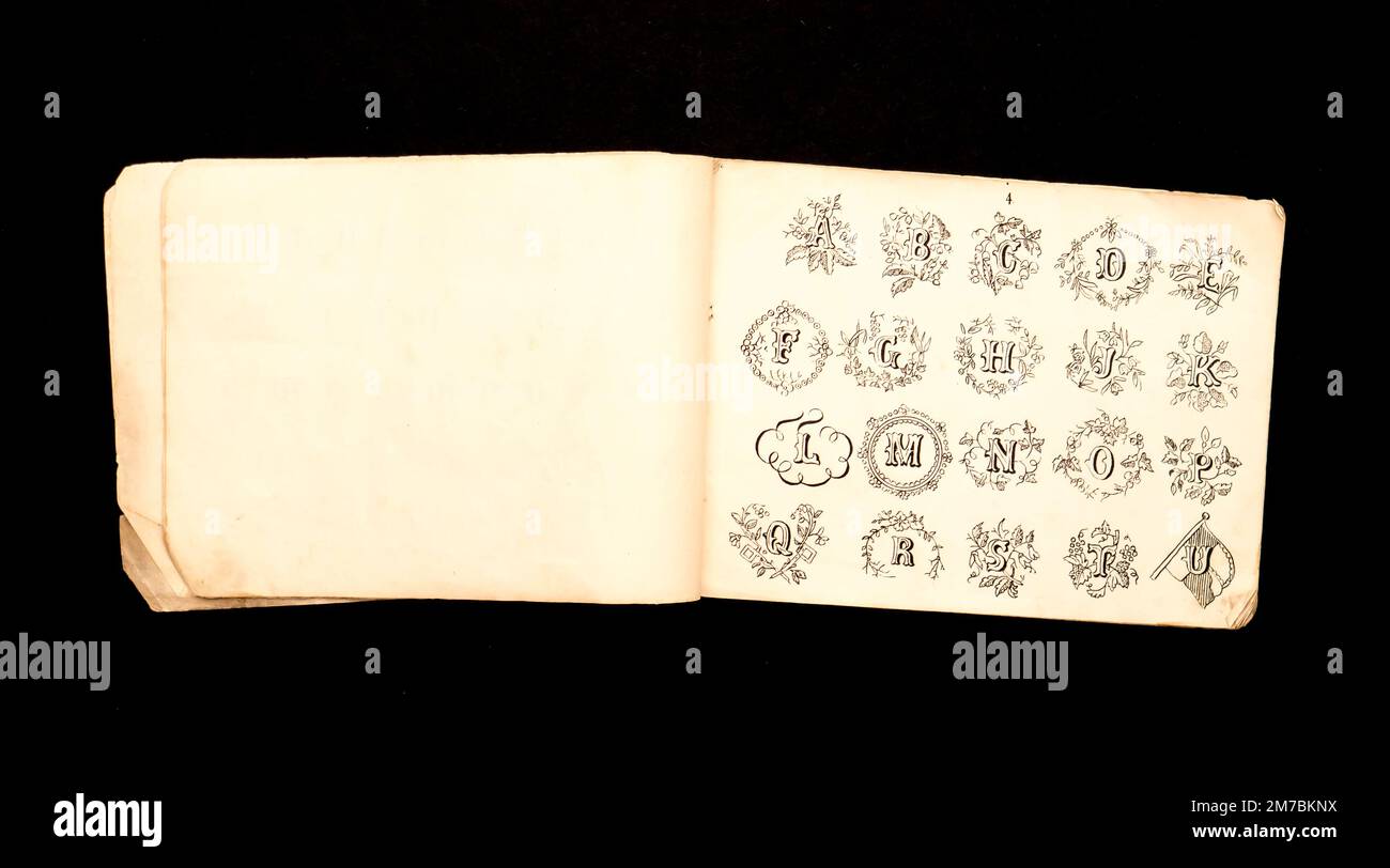 Album Letters. Marks of linen stitch Stock Photo - Alamy