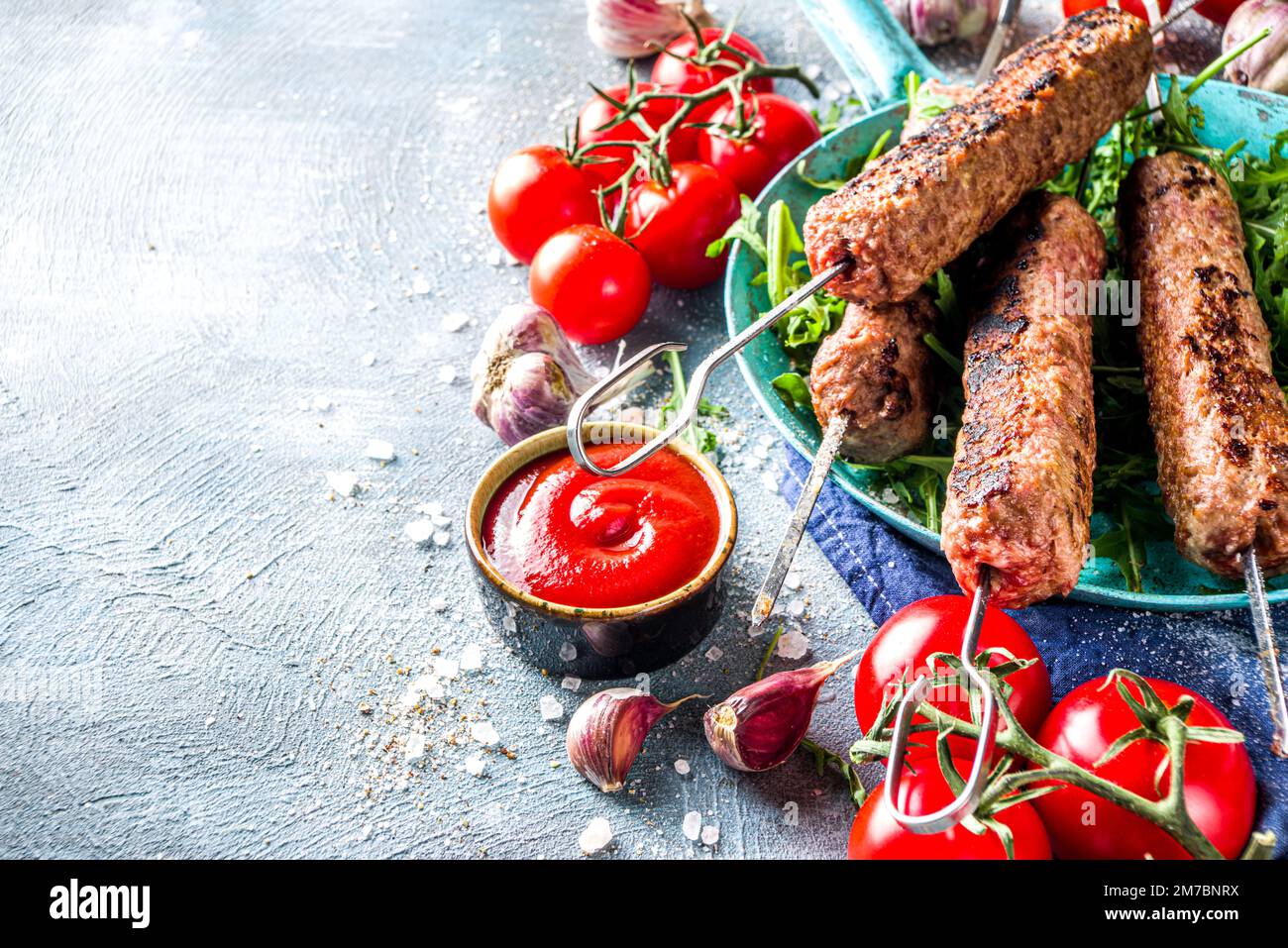 Shish kebab on skewers, from minced beef meat. Lula kebab, traditional ...