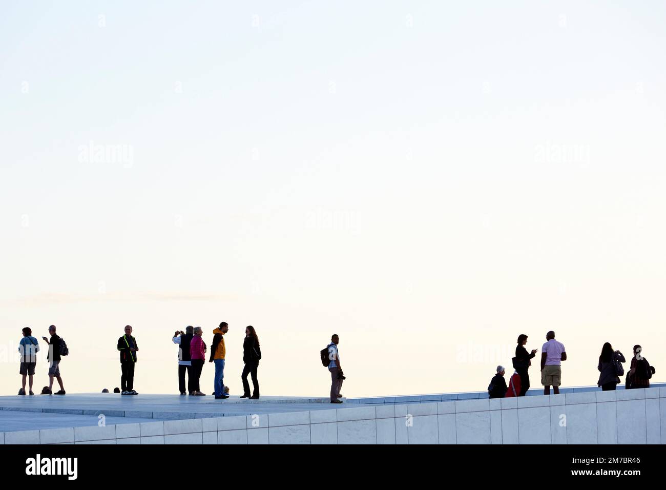 People walking on the roof of the Oslo opera house Stock Photo - Alamy