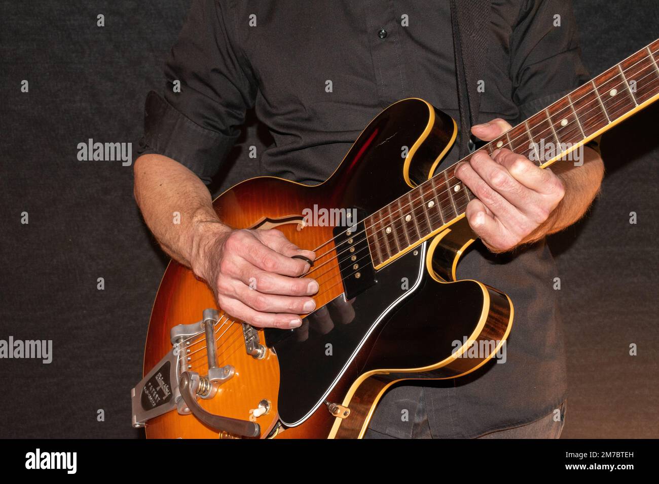 Vaduz, Liechtenstein, January 28, 2022 Artist is playing with a Gibson ...