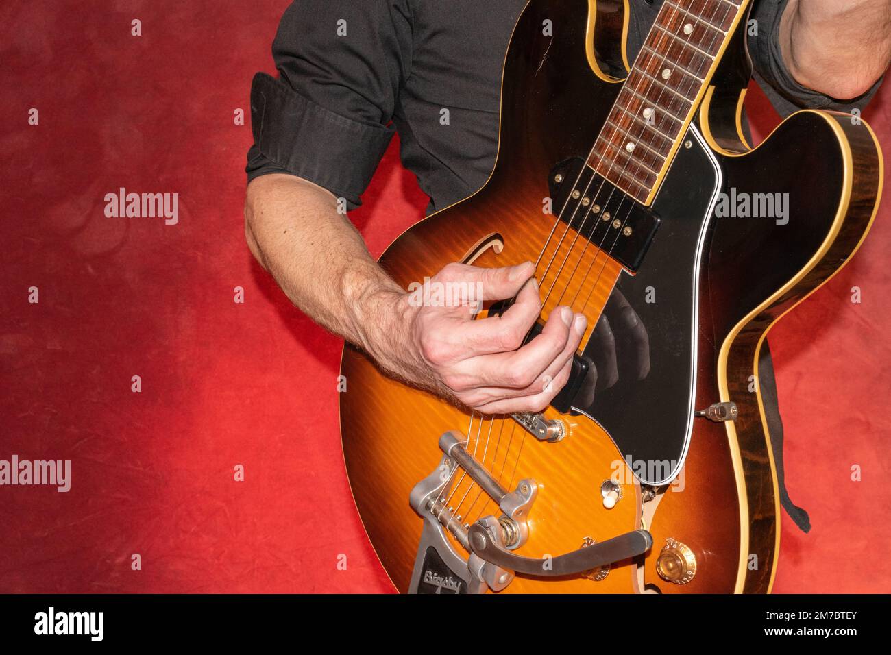 Vaduz, Liechtenstein, January 28, 2022 Artist is playing with a Gibson ...