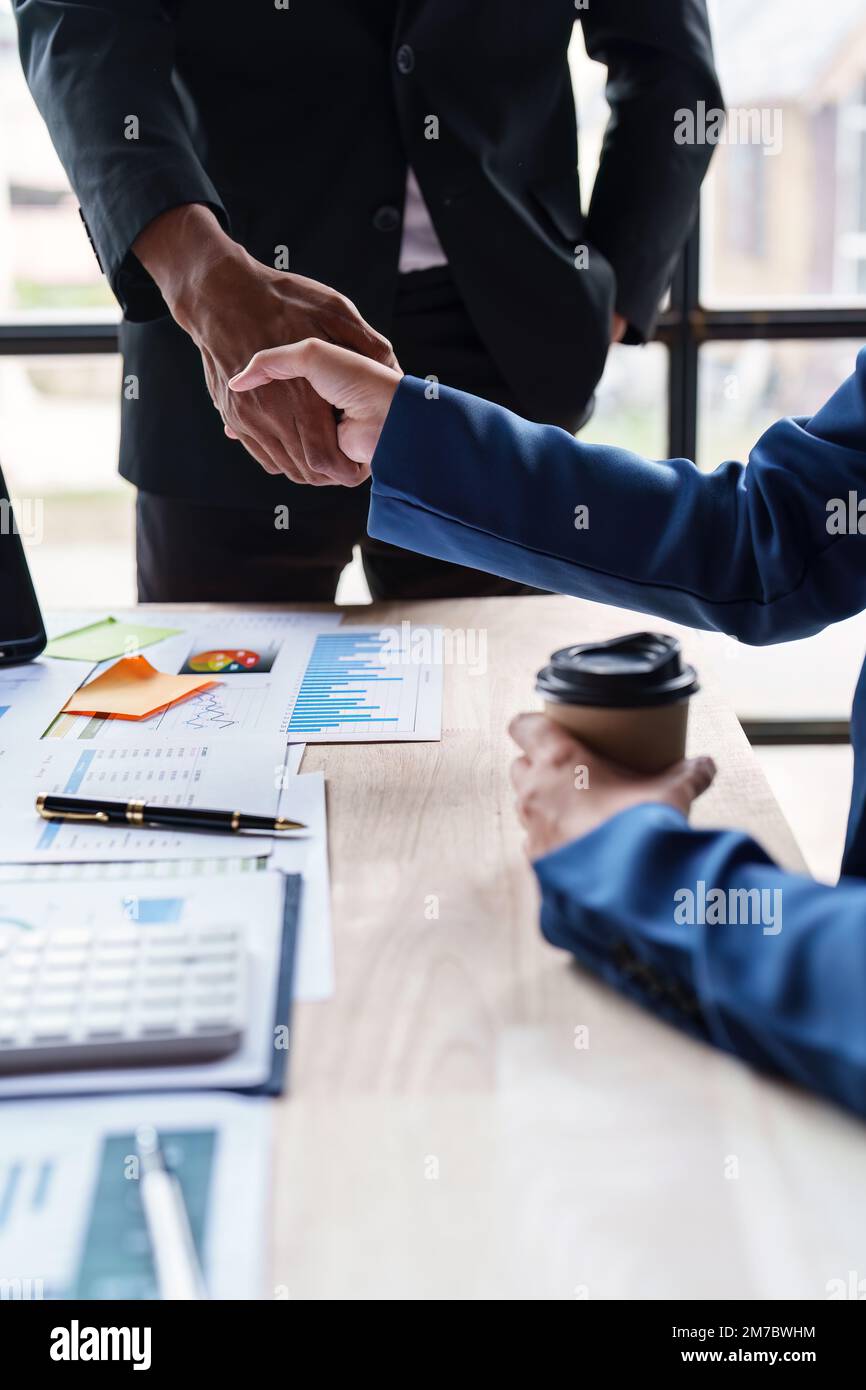Business shaking hands. Successful businessmen handshaking after good ...