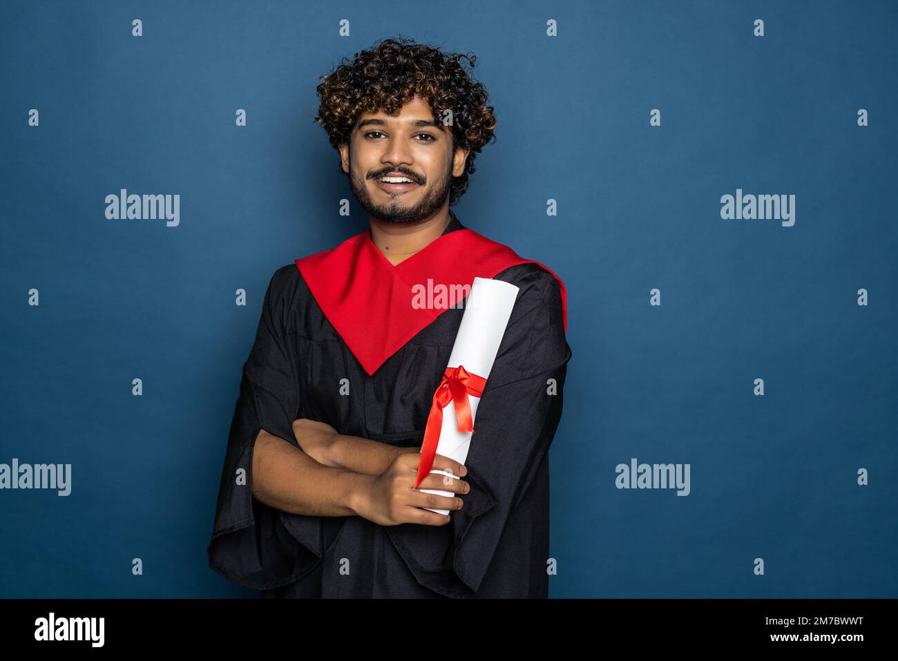 education, graduation and people concept - happy Indian Male graduate ...