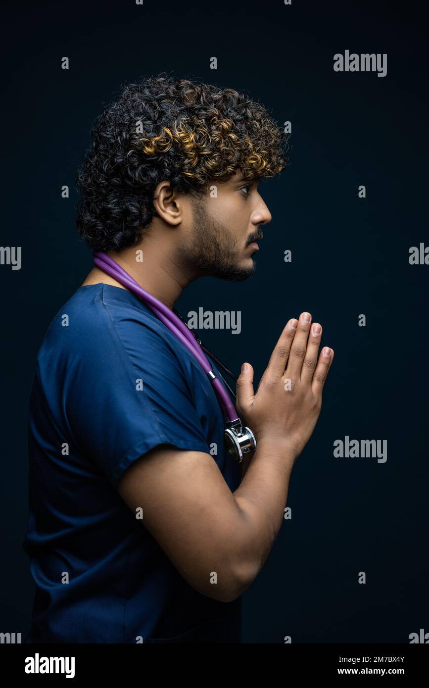 Closeup portrait, young depressed man healthcare practitioner holding ...