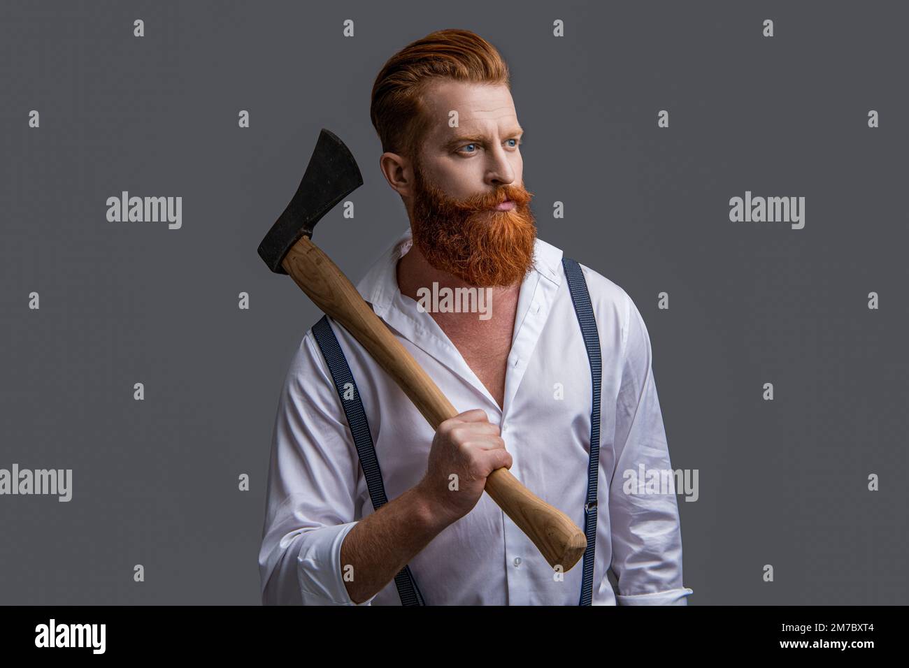 photo of caucasian masculinity of man with axe. masculinity of man with ...