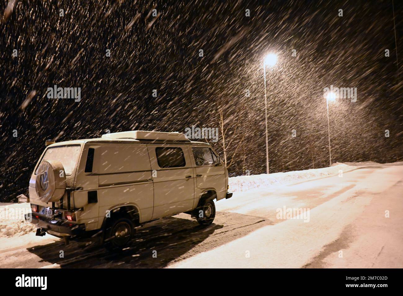 My van VW T3 on the road during a strong snow storm near Morsvik in the ...