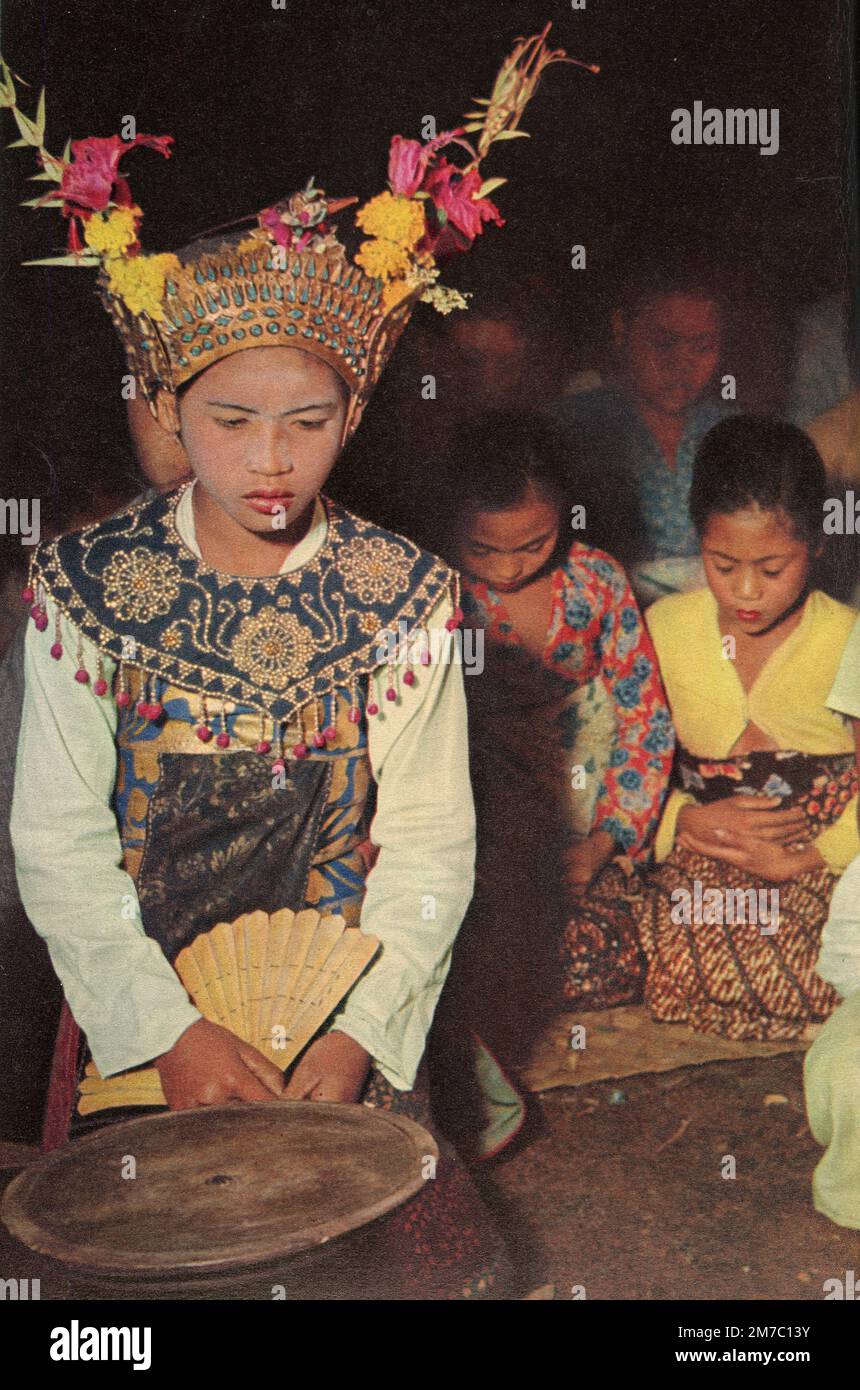 Dayak tribe children priestesses celebrating exorcism in Borneo from ...