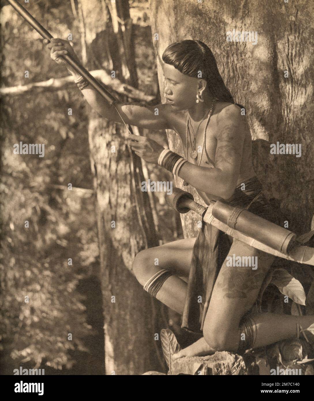 Dayak tribe man hunting with blowgun in Borneo from the documentary ...
