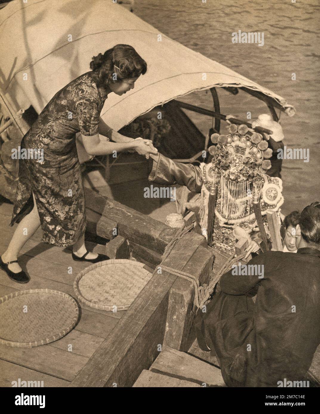 Dayak tribe bride getting onboard the groom's junk in Borneo from the ...