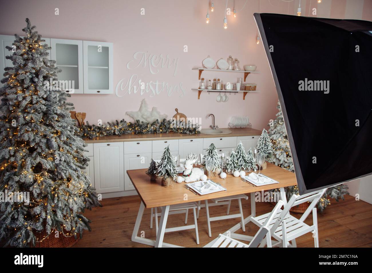 Close up of balls on christmas tree. Bokeh garlands in the background ...