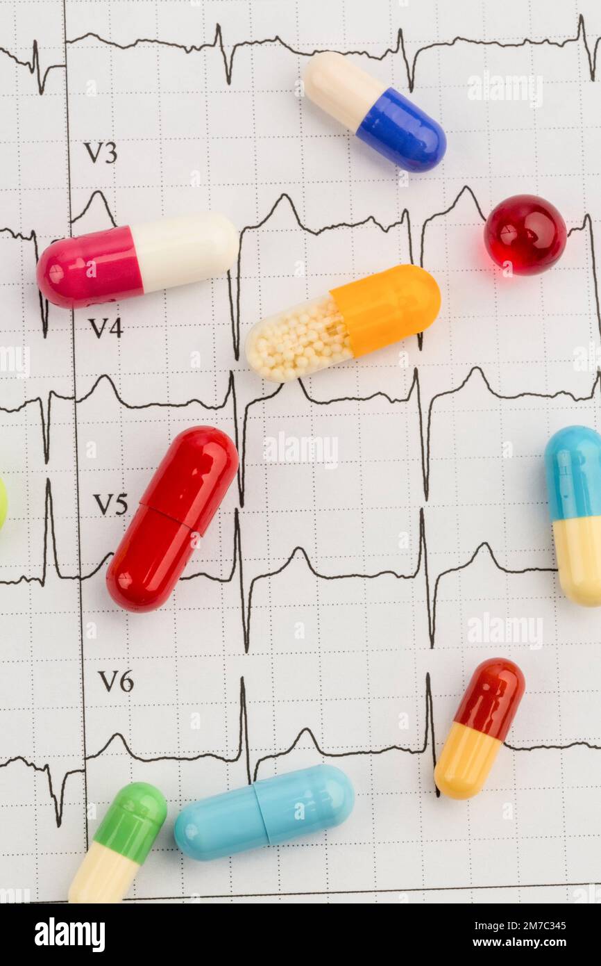 colourful pills on a ECG, cutout Stock Photo - Alamy