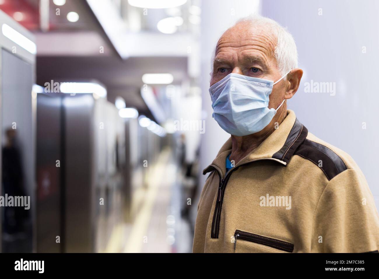 Senior man waiting train hi-res stock photography and images - Alamy