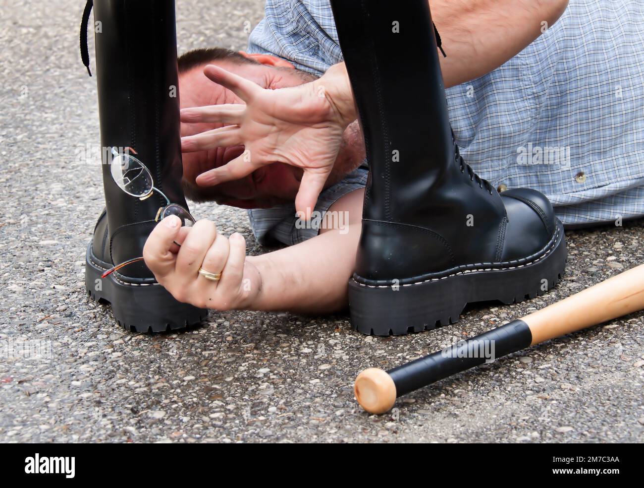 neo-Nazi has downd a victim, right wing radicalism Stock Photo - Alamy