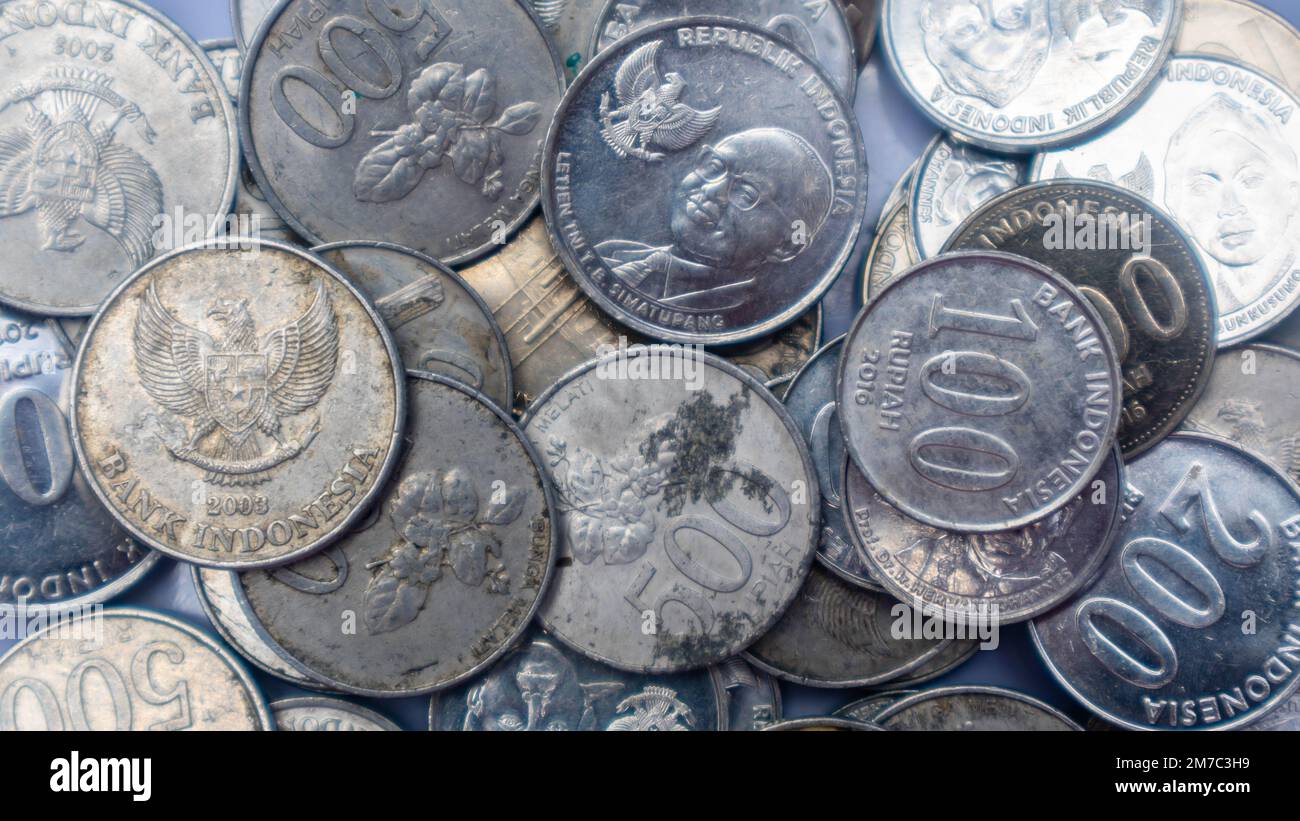 pile of rupiah coins as background Stock Photo - Alamy
