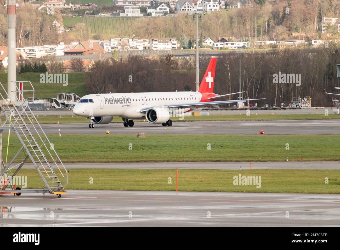 Zurich, Switzerland, December 23, 2022 Helvetic airlines Embraer E195 ...