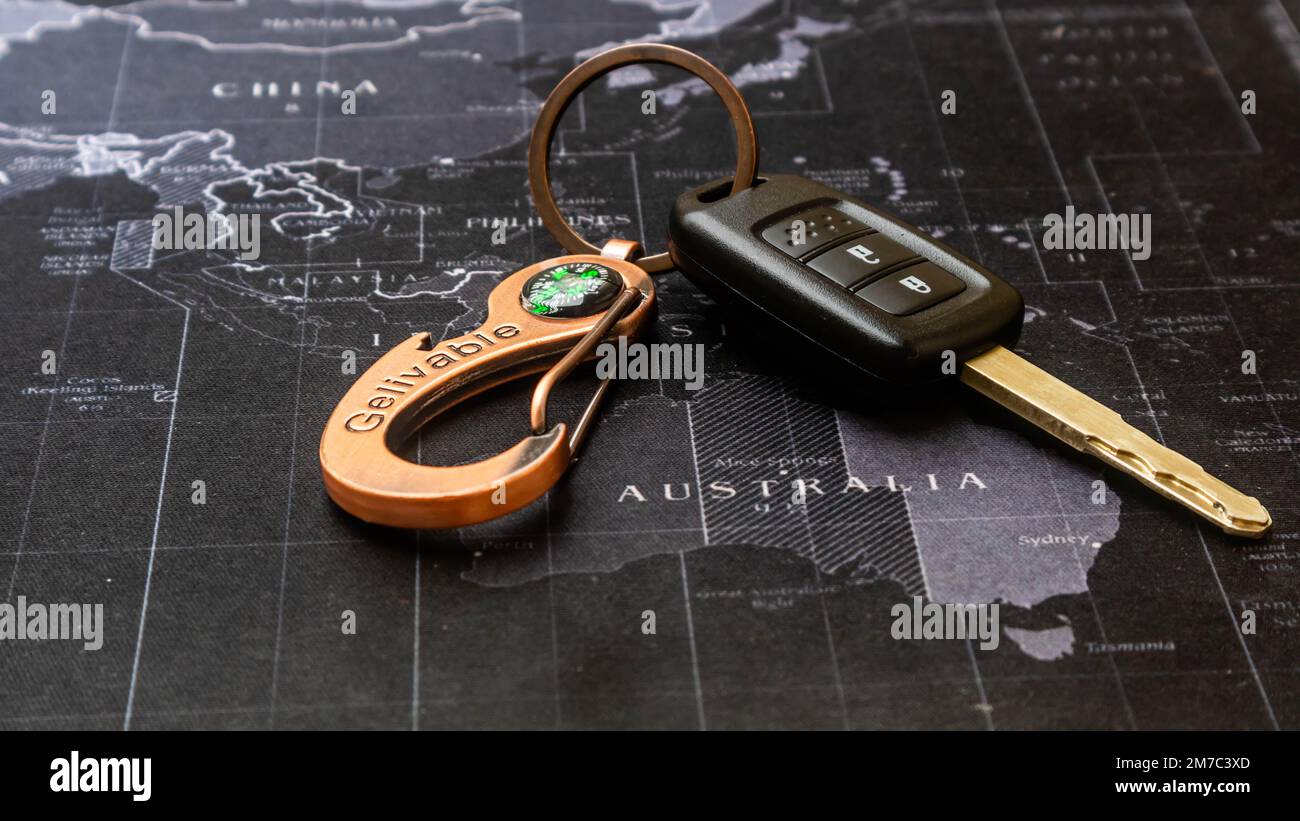 black car key over black map Stock Photo - Alamy