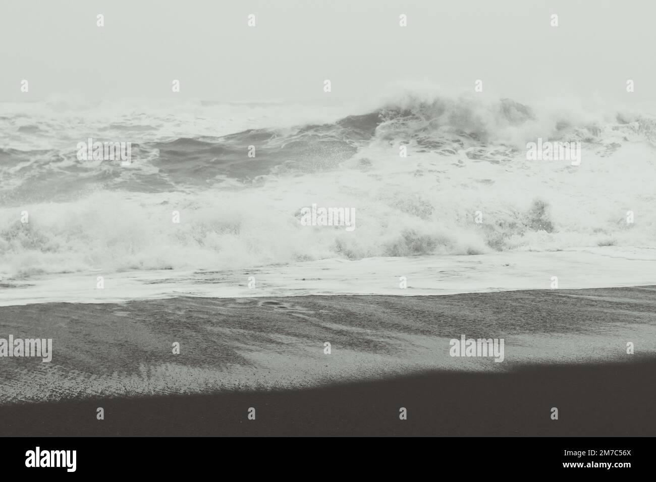 Heavy storm on sea beach monochrome landscape photo Stock Photo - Alamy