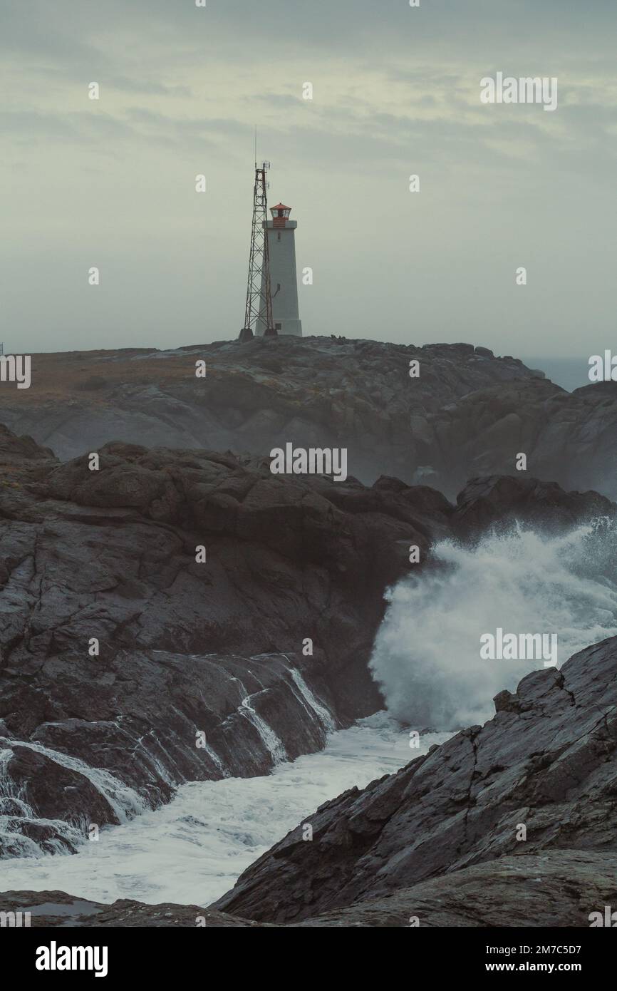 Beacon with radio tower on beach landscape photo Stock Photo - Alamy