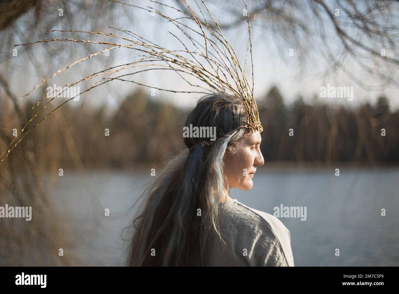 Close up middle age woman with willow branches crown portrait picture ...