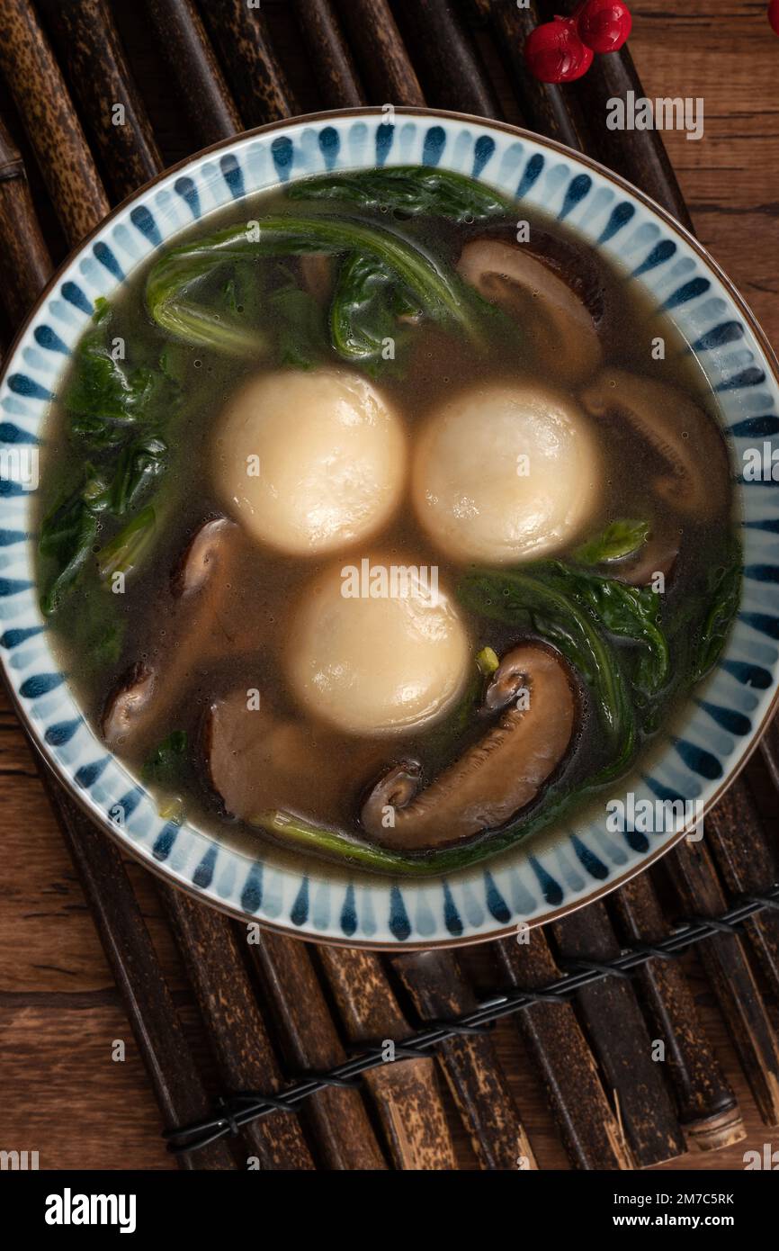 Eating big tangyuan yuanxiao (tang yuan, glutinous rice dumpling balls ...