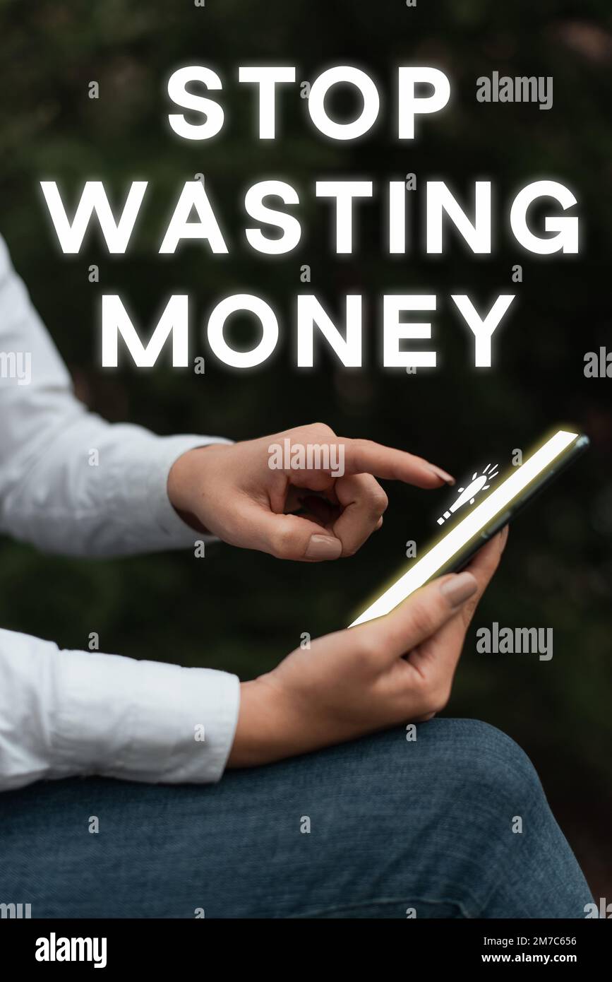 Sign displaying Stop Wasting Money. Concept meaning advicing person or ...
