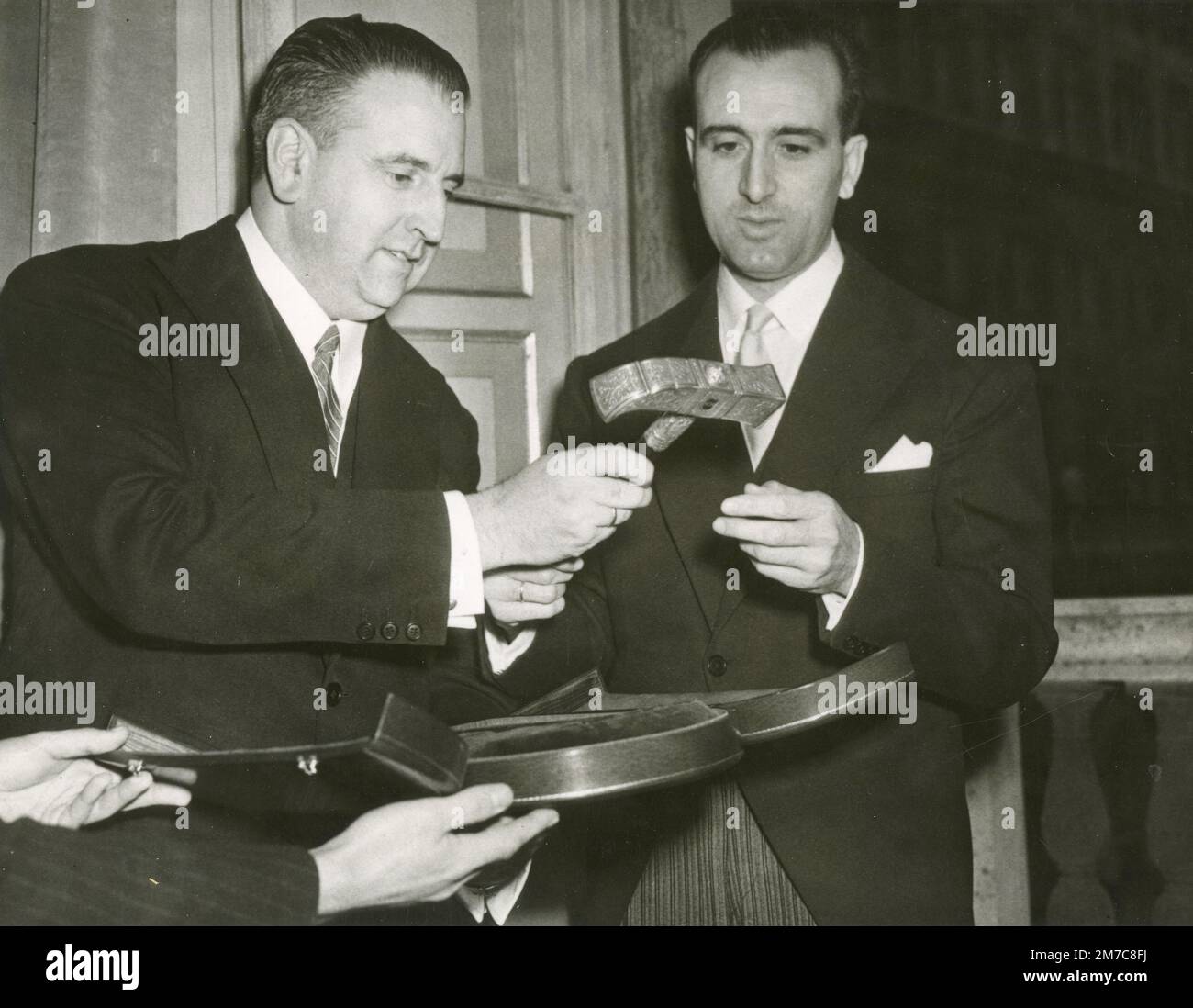 Spanish Ambassador Joaquin Ruiz-Gimenez (right) receiving a precious ...