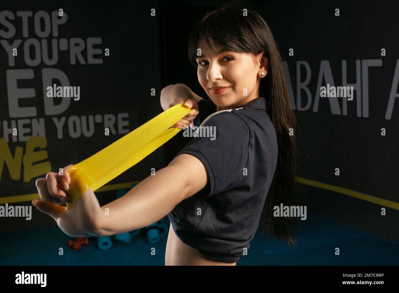 Nice sporty muscular fitness model athletic girl doing exercises ...