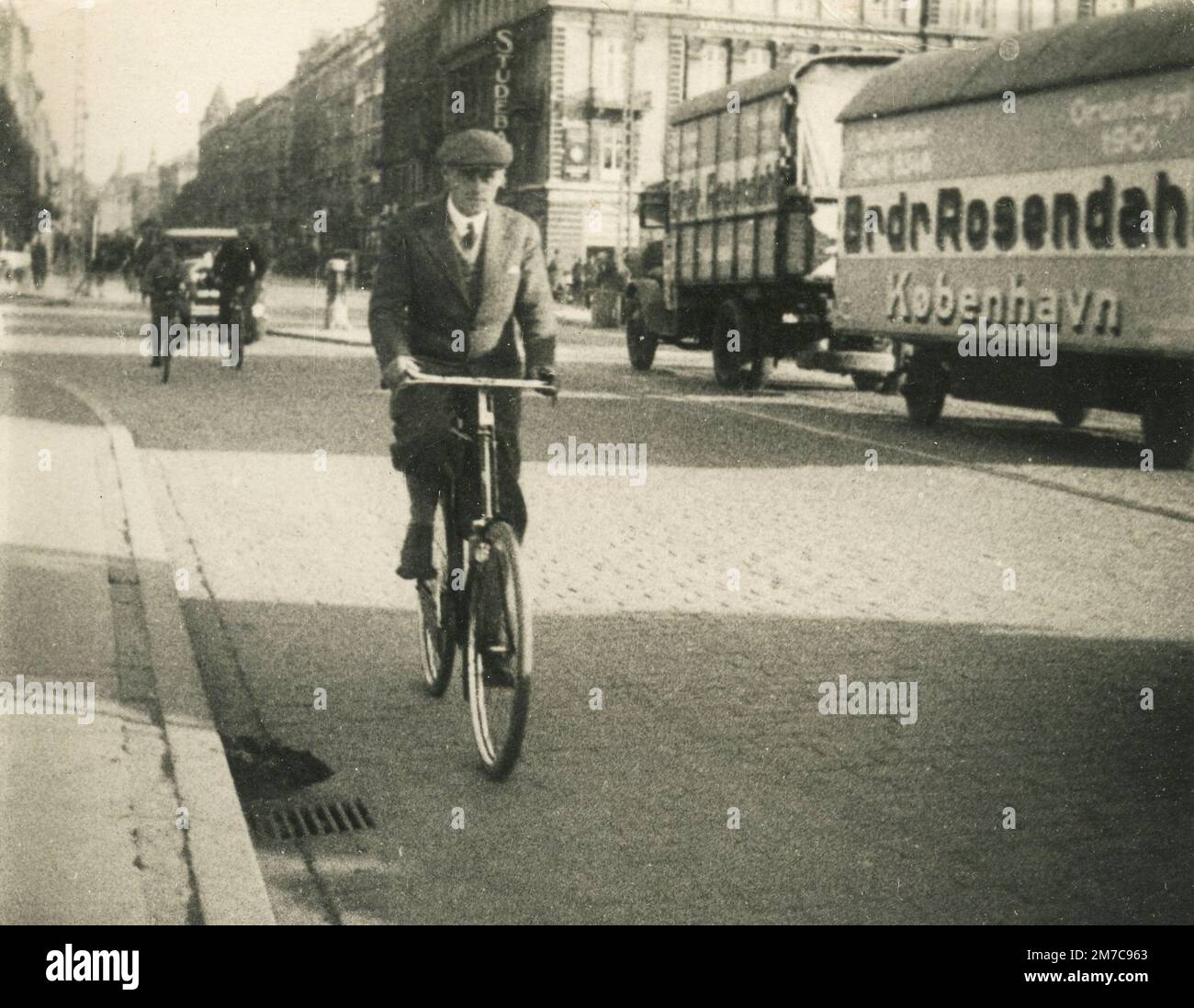 Man riding a bicycle, Copenhagen, Denmark 1950s Stock Photo - Alamy