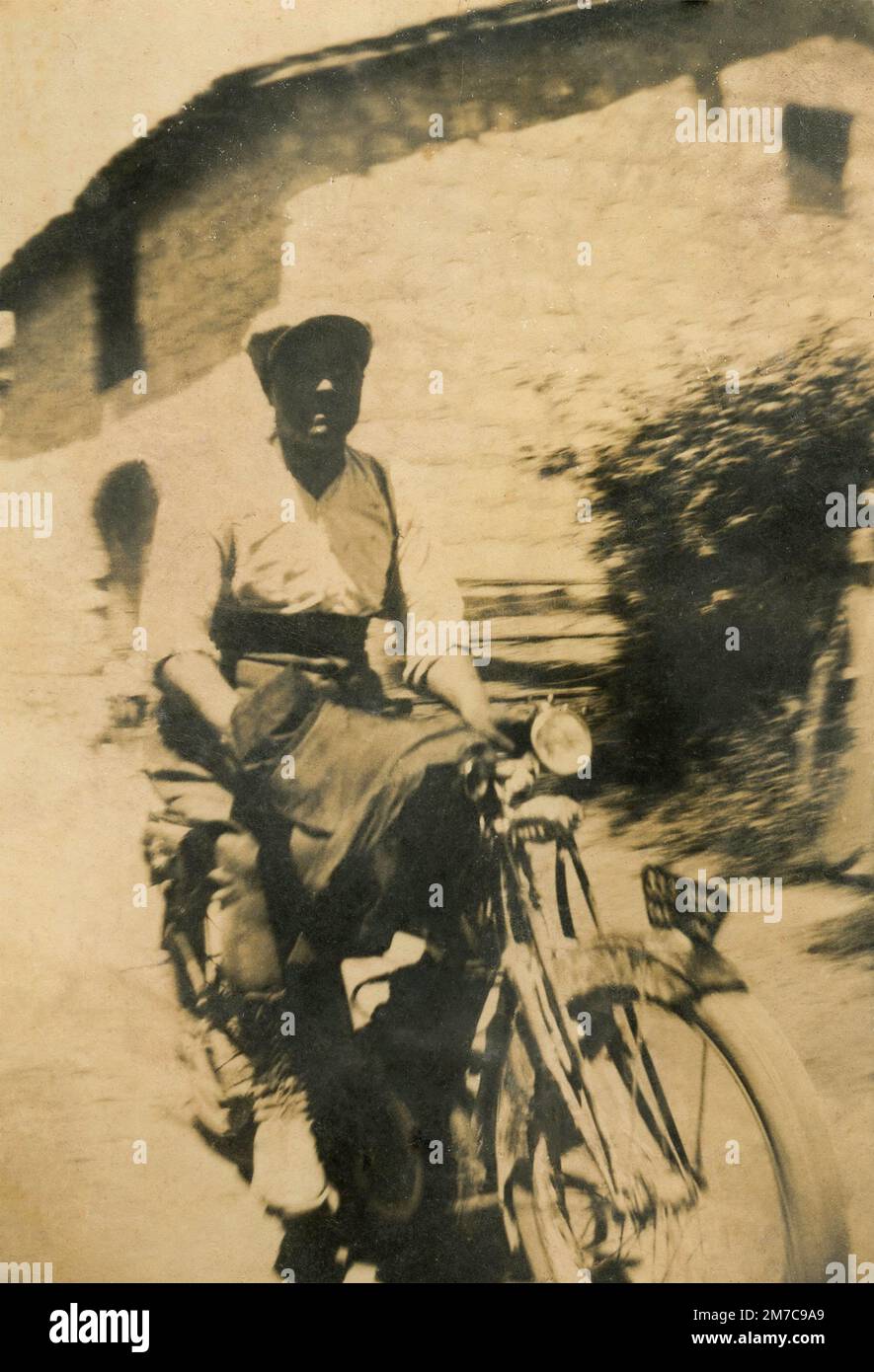 Man on a small motorbike, Italy 1933 Stock Photo - Alamy