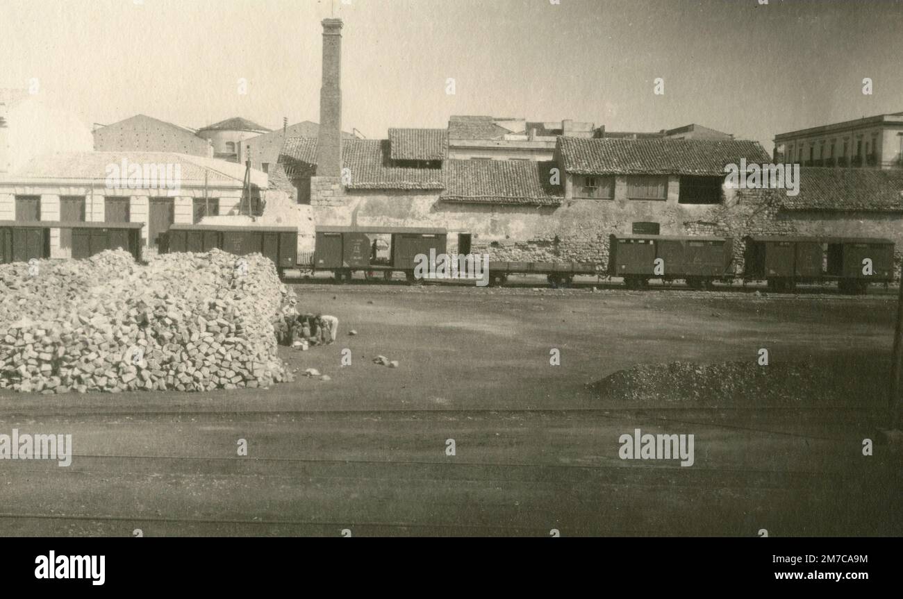 Freight train to be loaded with stones, Italy 1910s Stock Photo - Alamy