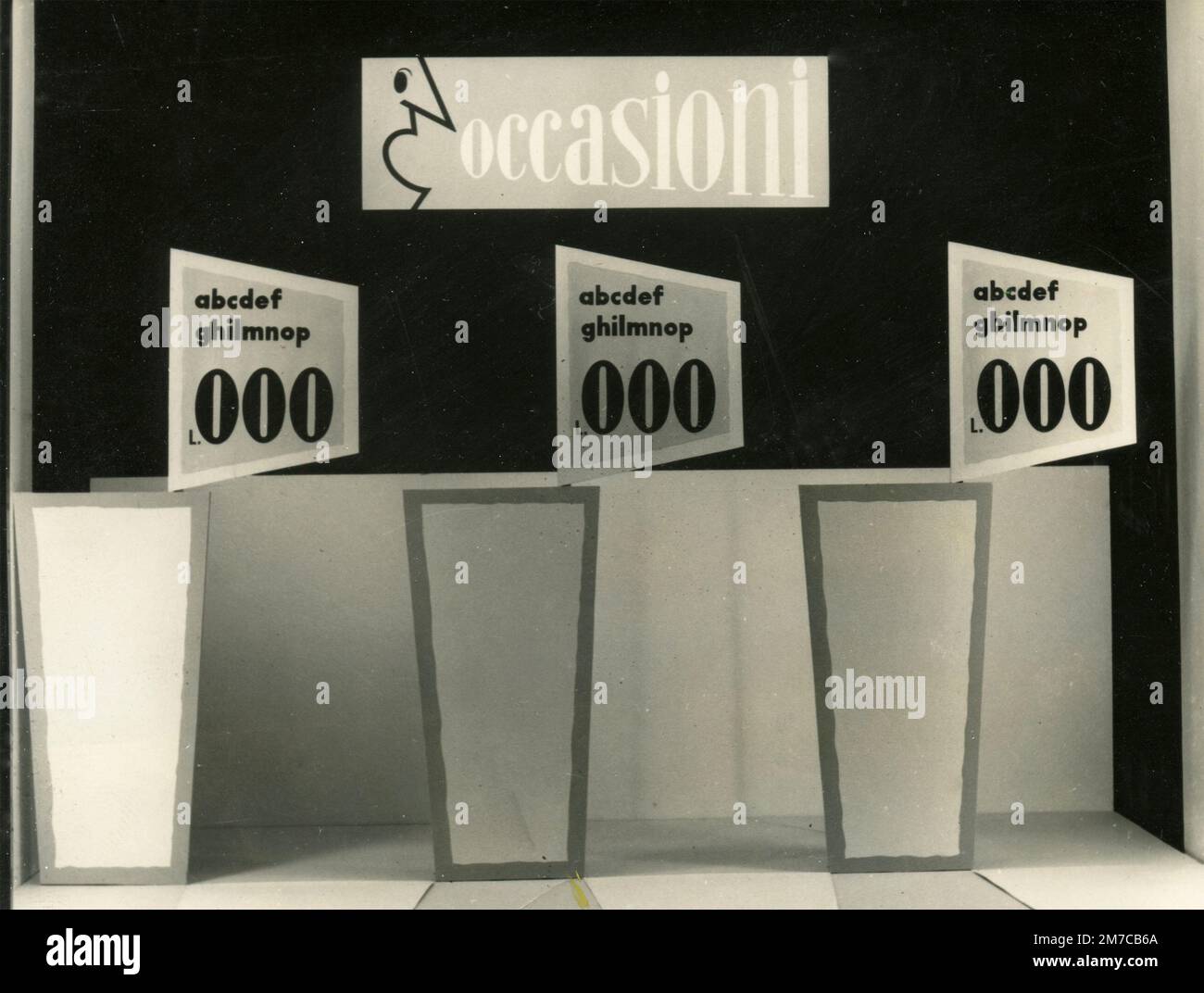 Shop window with occasions advertisement photo, Italy 1960s Stock Photo ...