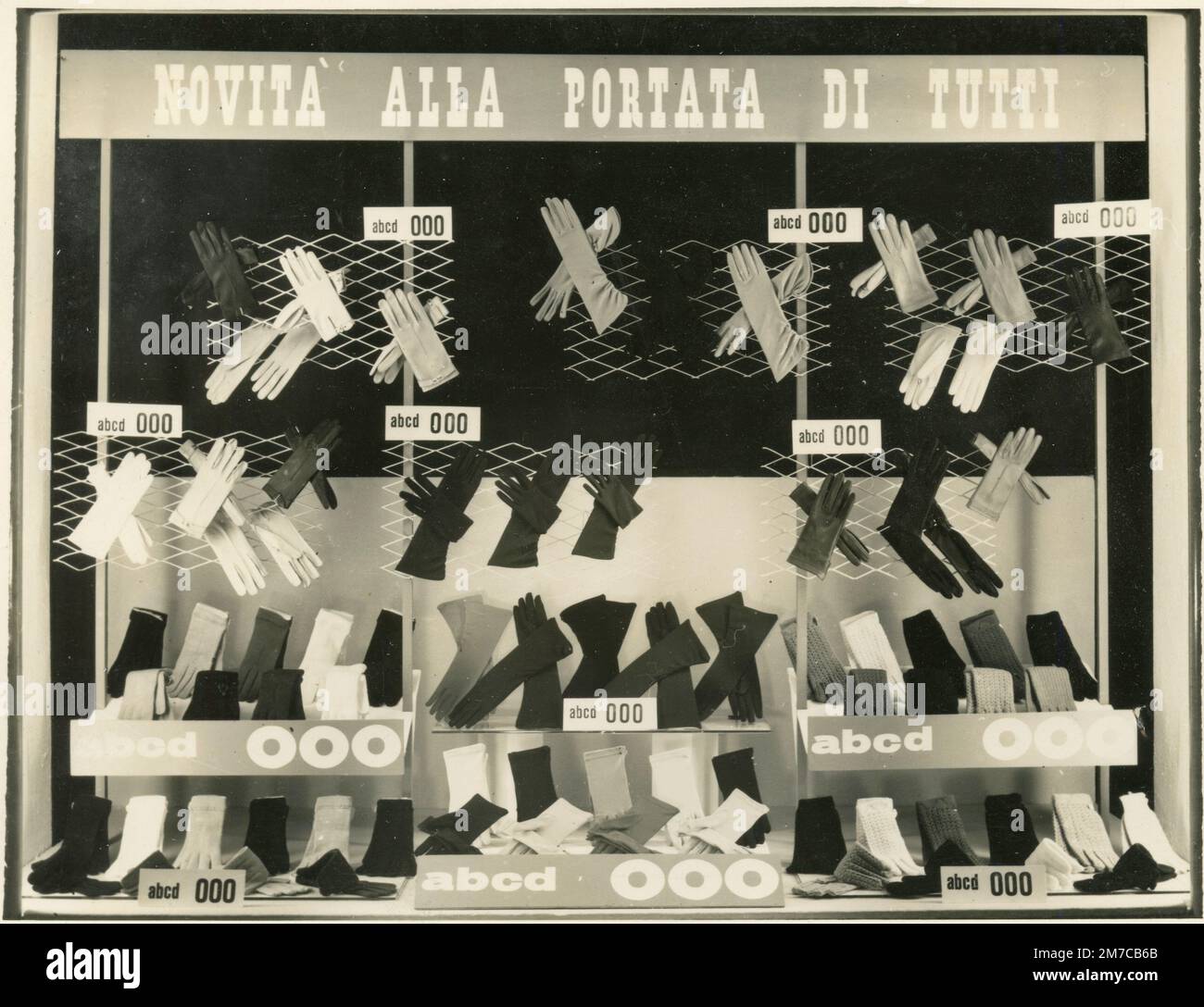 Shop window with gloves, advertisement photo, Italy 1960s Stock Photo ...