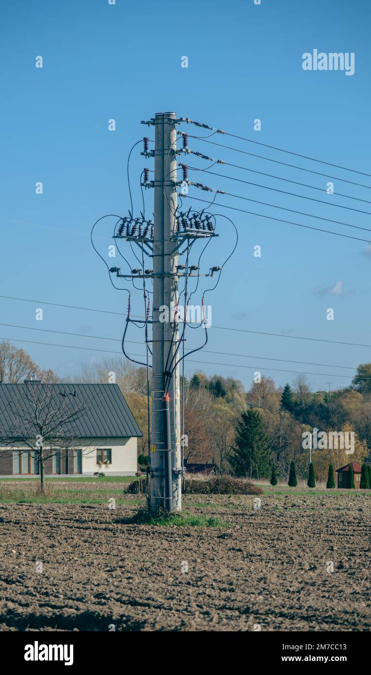 Energy infrastructure against the background of buildings, forest and ...