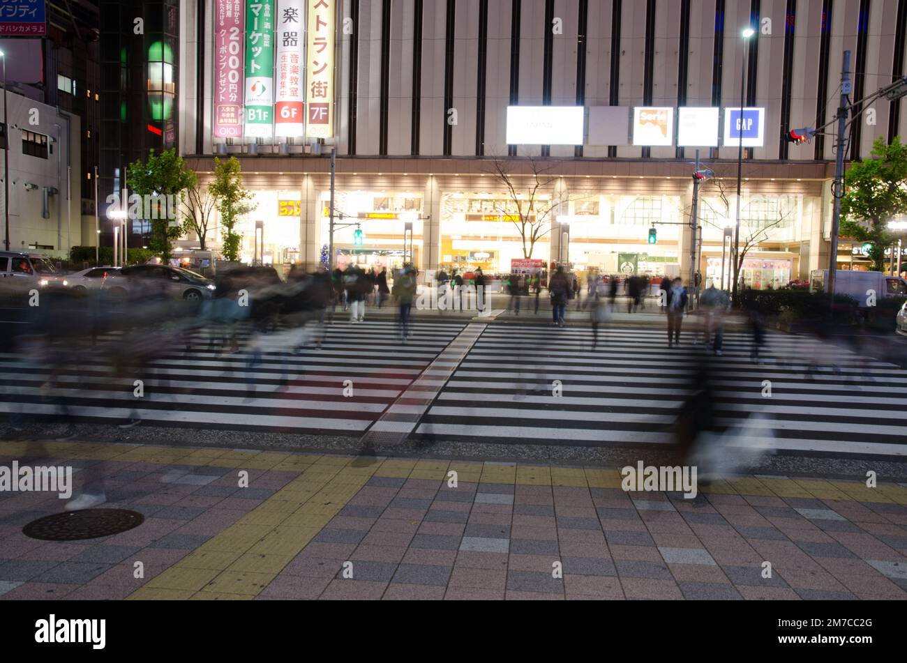 Tokyo, December 13, 2017: Pedestrian walkway in Sumida City at night ...