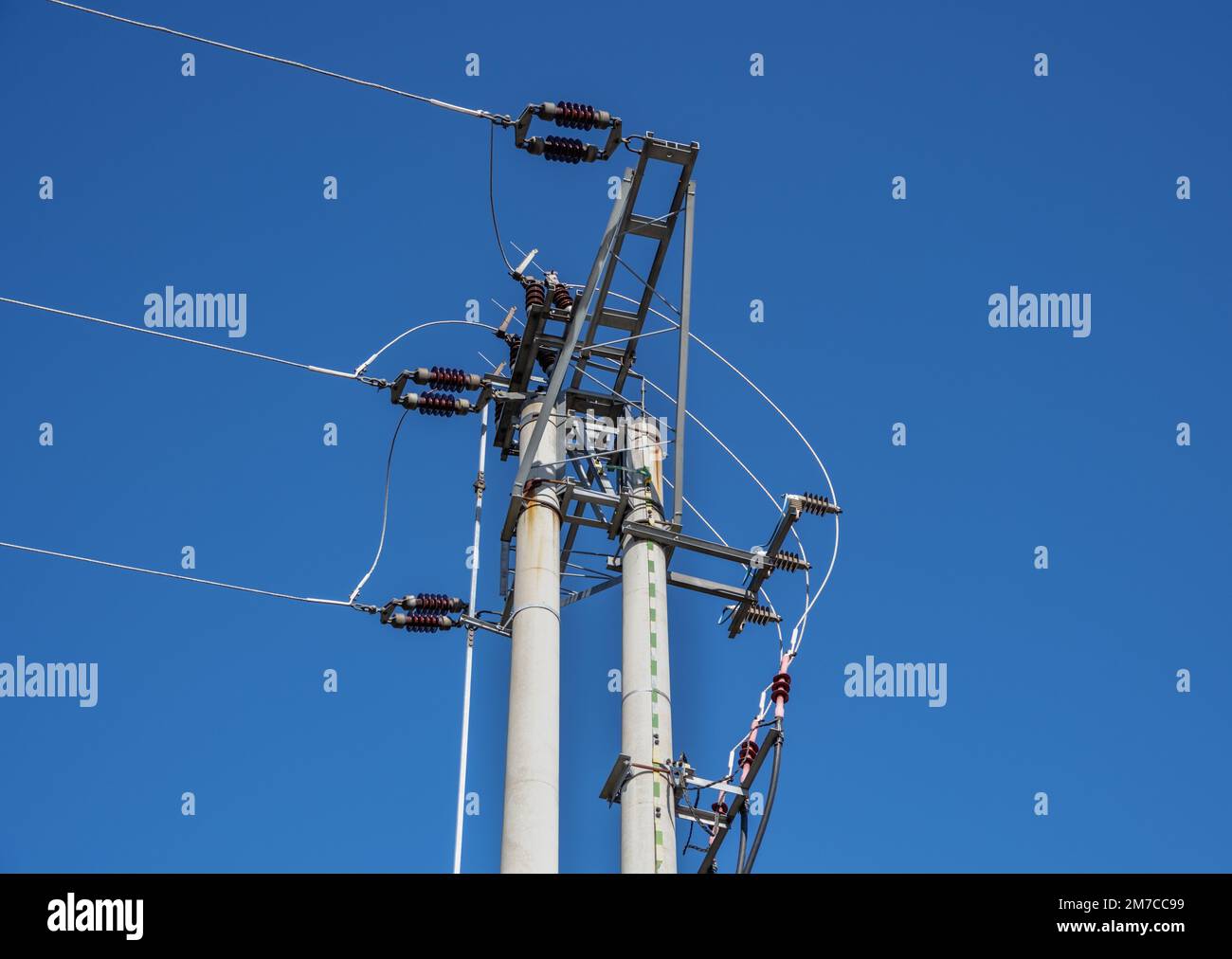 High-voltage power poles against the sky, transmission lines Stock ...