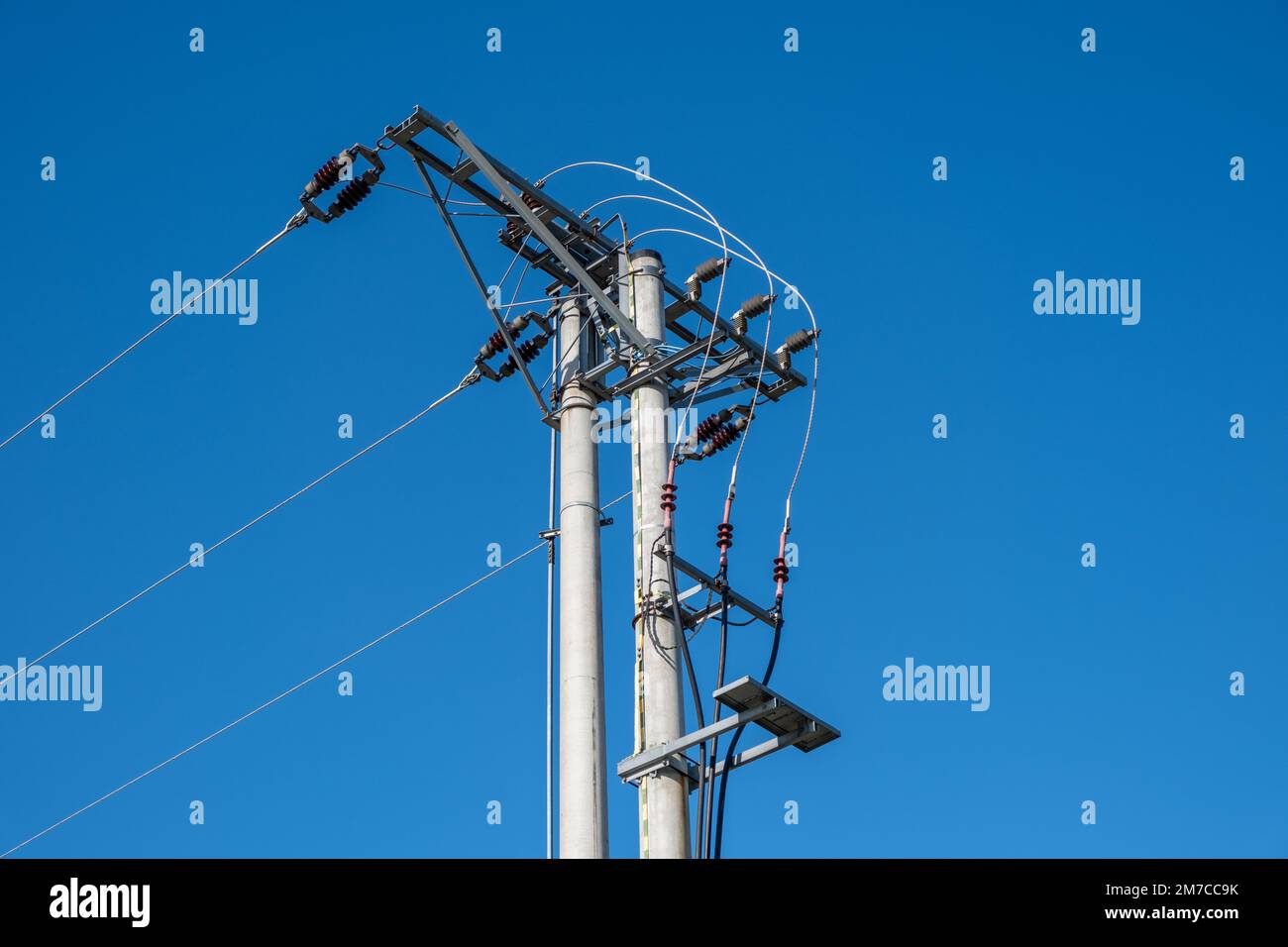 Medium voltage pole with transmission line in Poland Stock Photo - Alamy